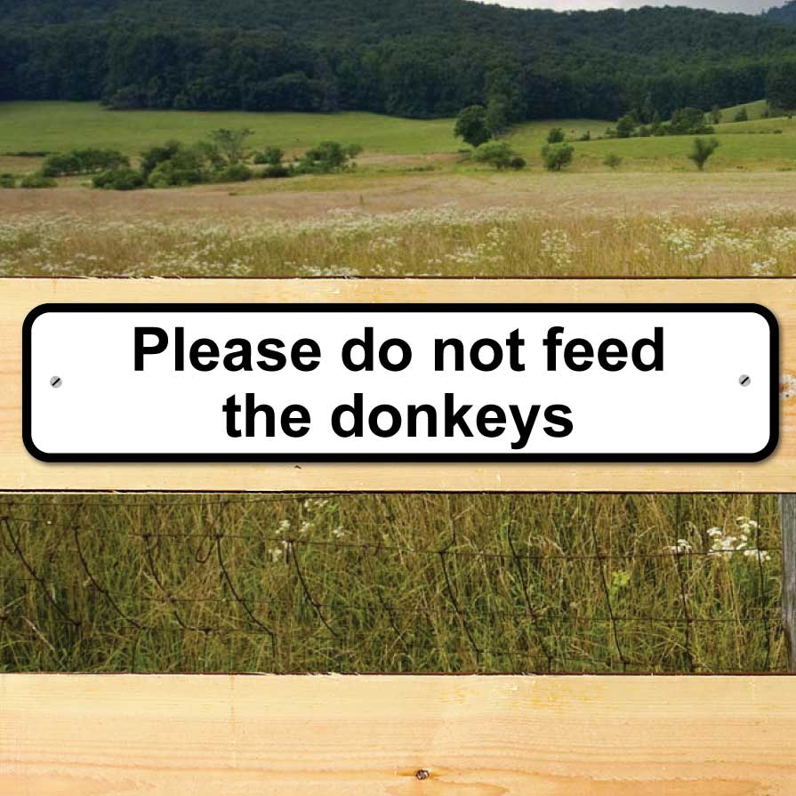 JAF Graphics. Please do not feed the donkeys sign